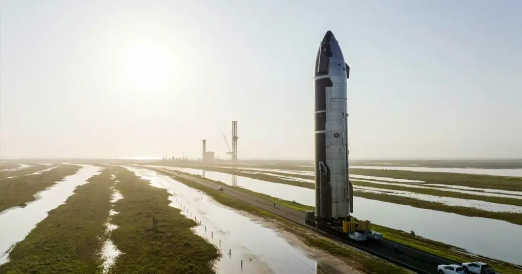 A stunning rendering shows a starship with a full NASA paint job